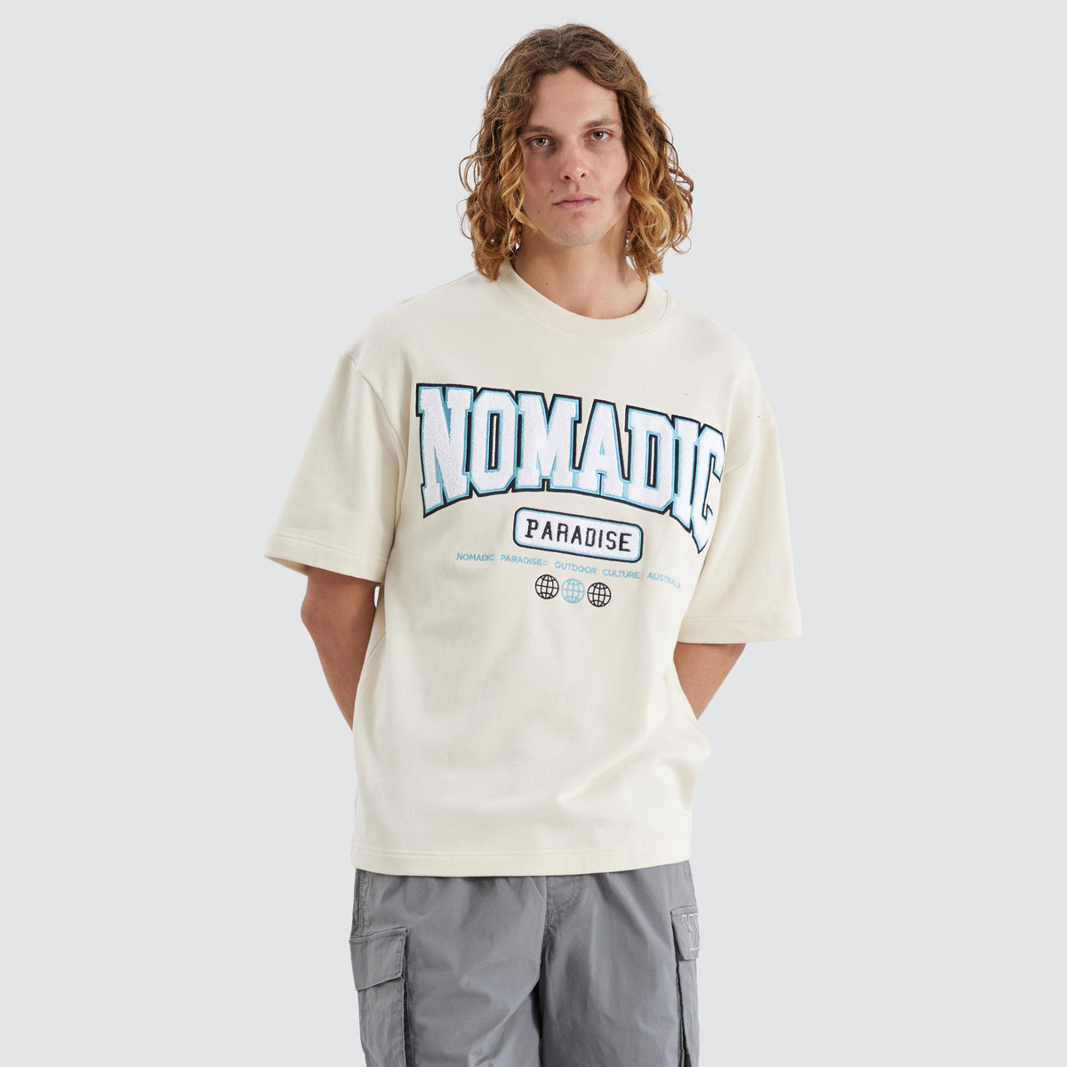 NOMADIC College Loopback Street Tee in Tofu Neutral | Neverland Store