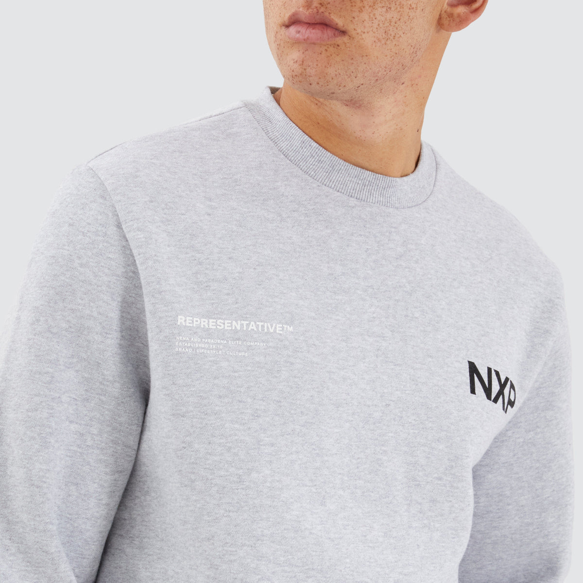 NXP Phase Dual Curved Hem Sweater in Grey Marle | Neverland Store