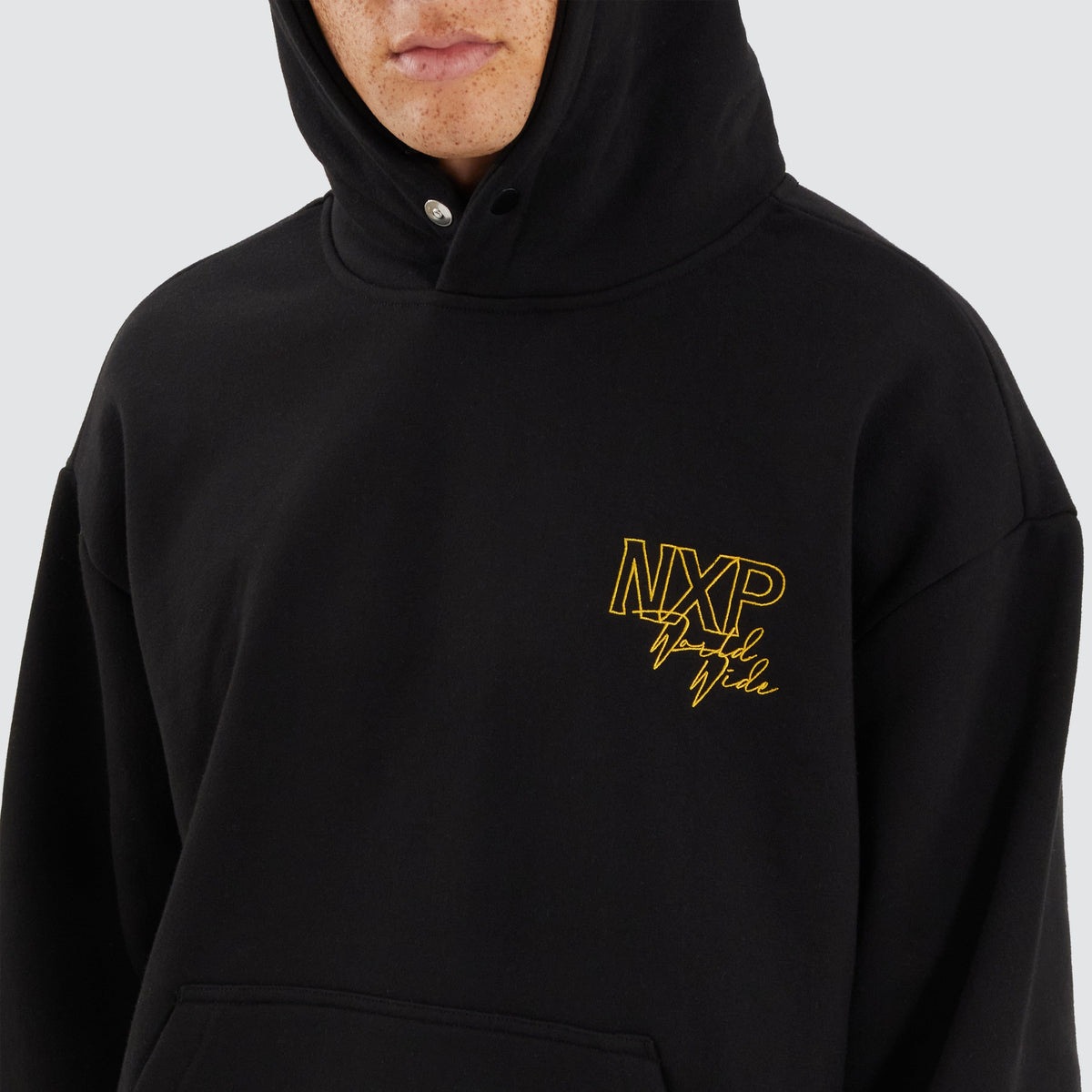 NXP Olympia Box Fit Hoodie in Jet Black | Neverland Store